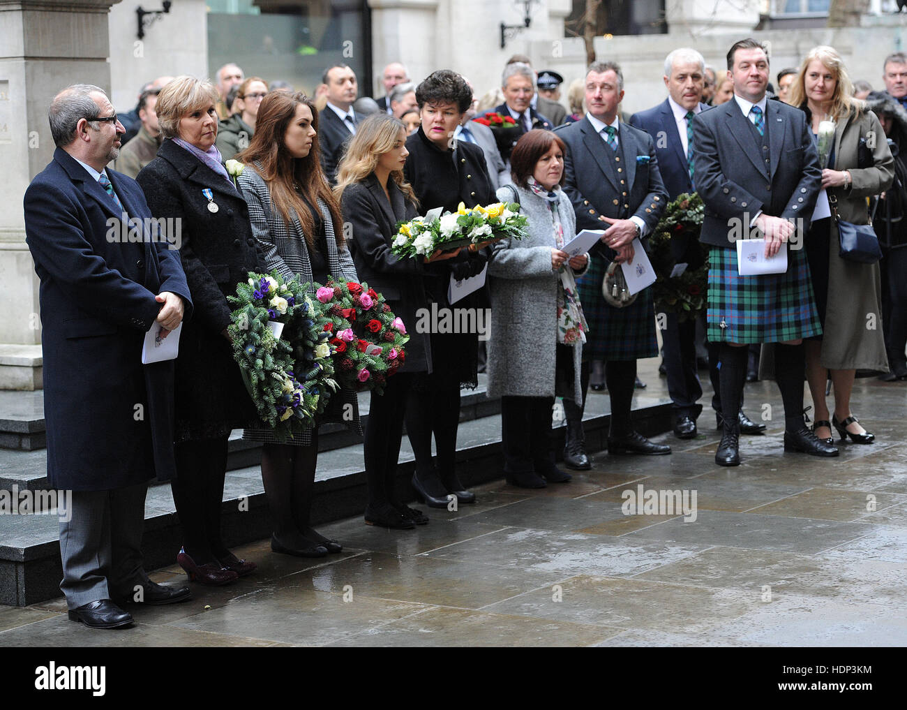 Victoria Morrison (second left), the widow of Detective Constable Jim ...