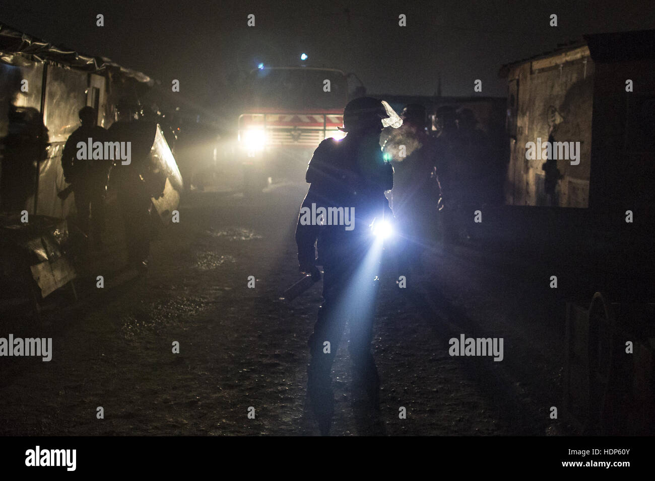 Firefighters in the Calais Jungle putting out fires set alight by ...
