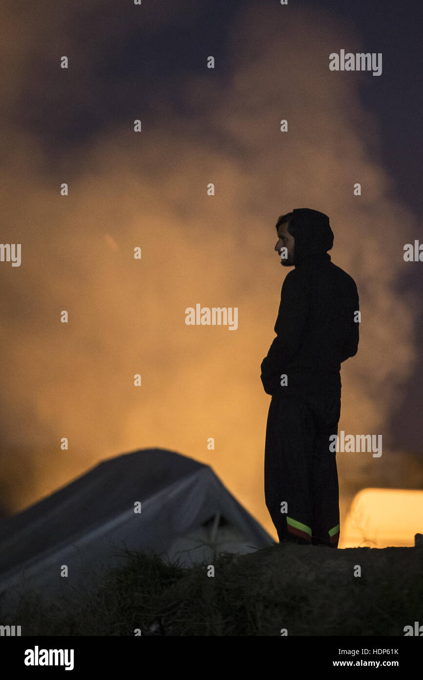 Firefighters in the Calais Jungle putting out fires set alight by ... Firefighters in the Calais Jungle putting out fires set alight by ...