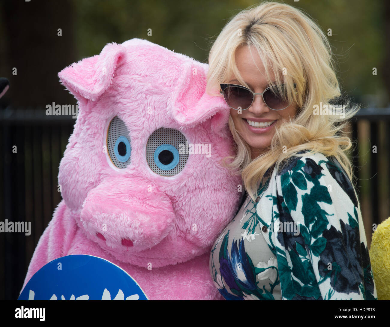 Pamela Anderson poses with PETA's giant animal mascots to promote vegan ...