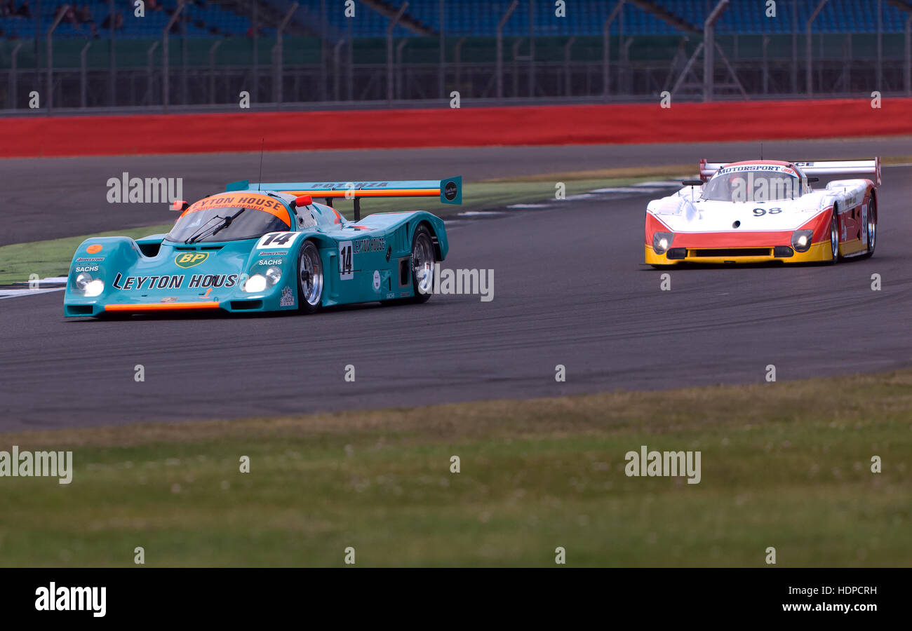 A 1987 Porsche 962 driven by Tommy Dreelan leads a 1990 Spice SE90C ...