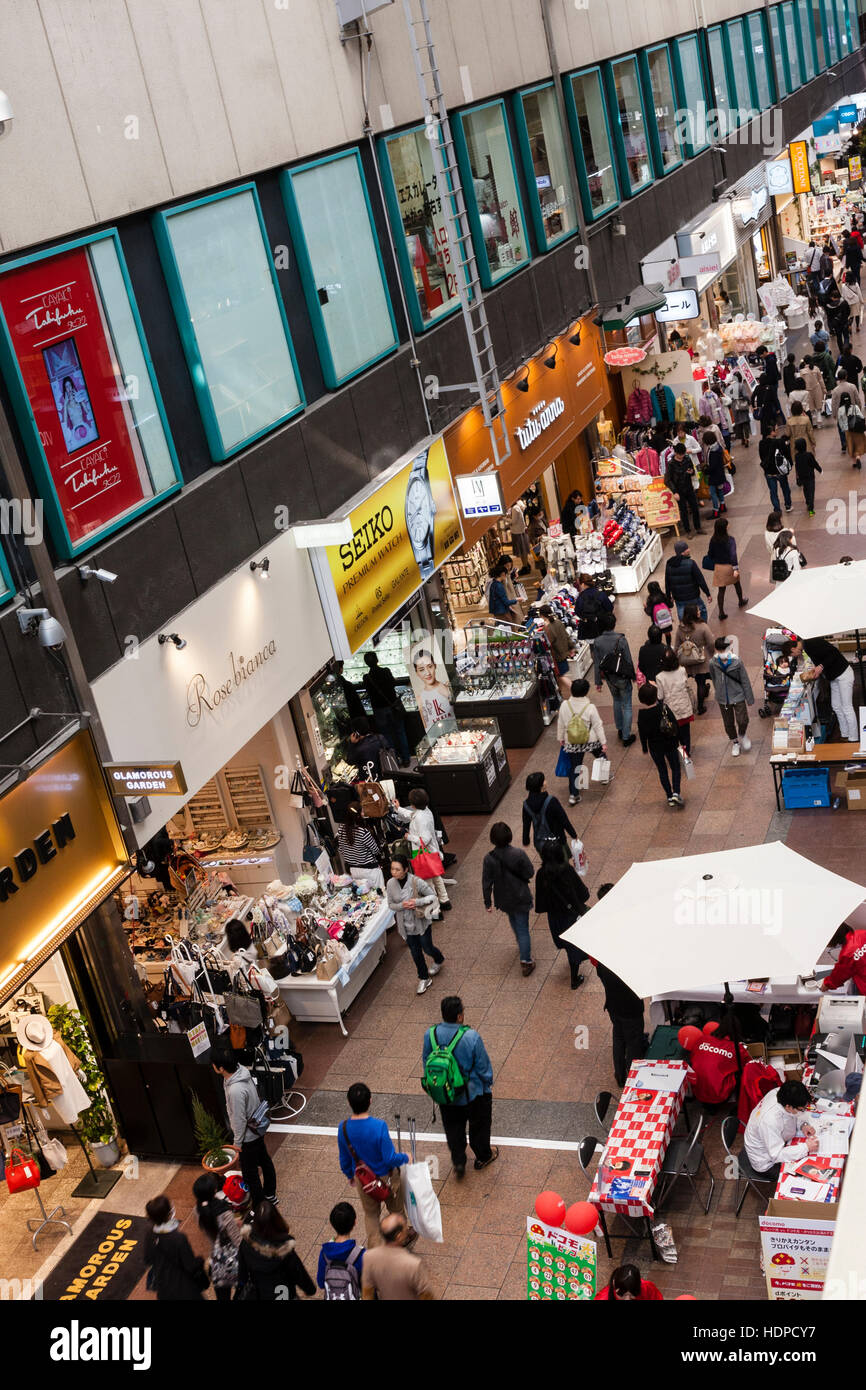 Japan, Kobe, Sannomiya. Overhead view of crowded shopping arcade ...