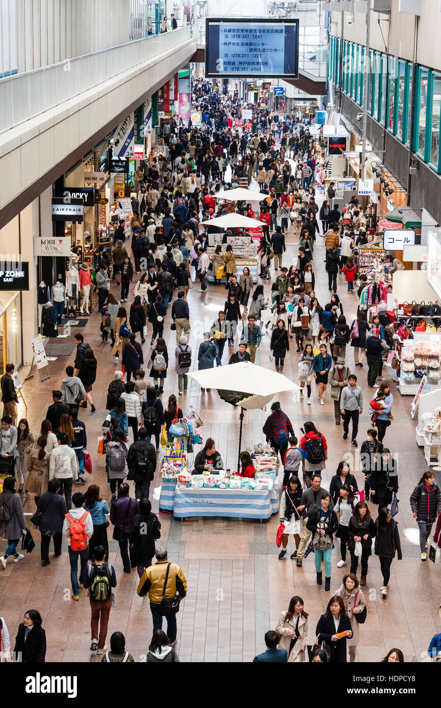 Japan, Kobe, Sannomiya. Overhead view of crowded shopping arcade ...