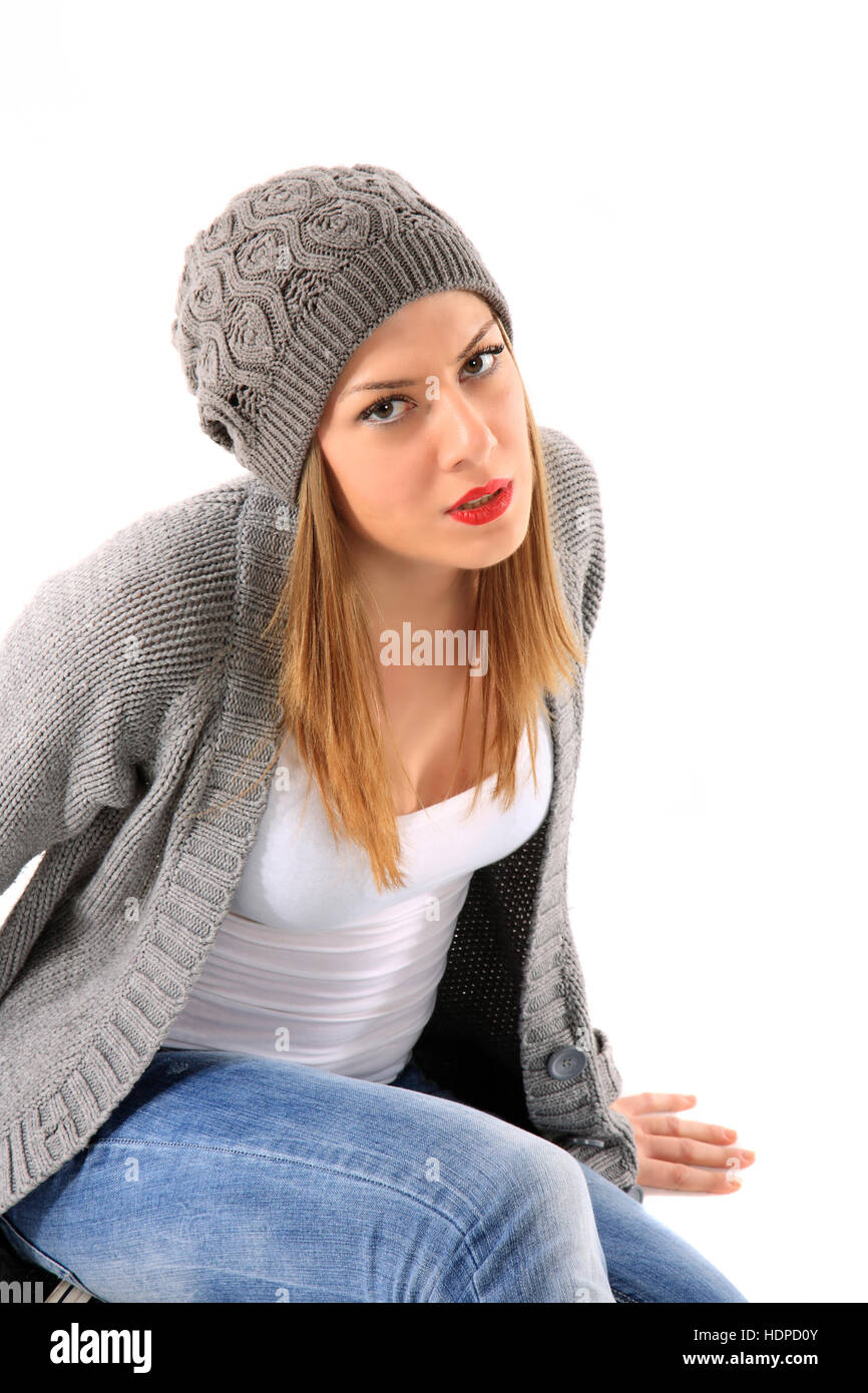 portrait of beautiful girl seating on the floor isolated on a white ...