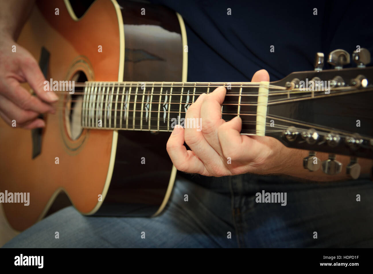 performer playing on the acoustic guitar Stock Photo - Alamy