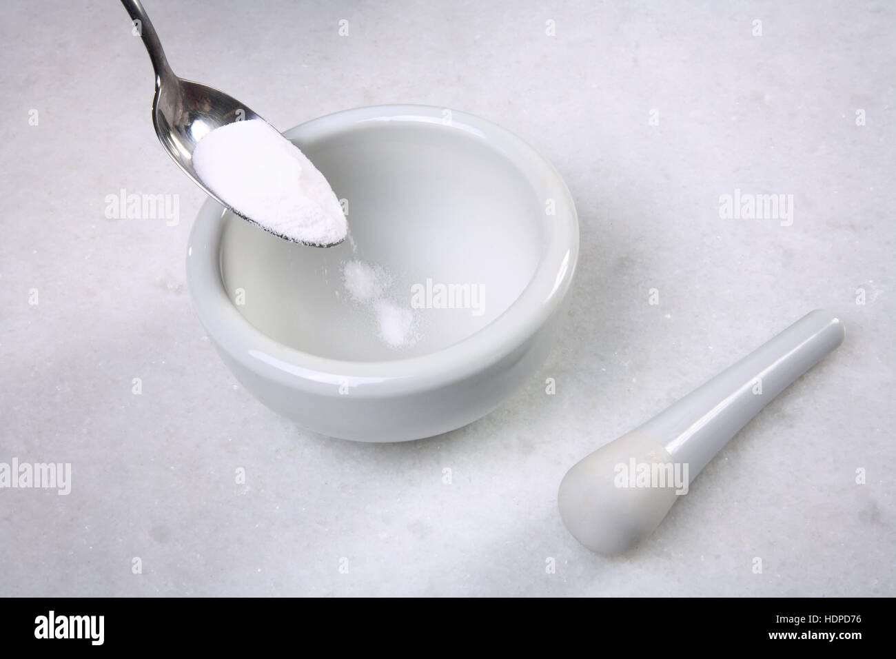 mortar pestle and spoon with powder closeup Stock Photo - Alamy