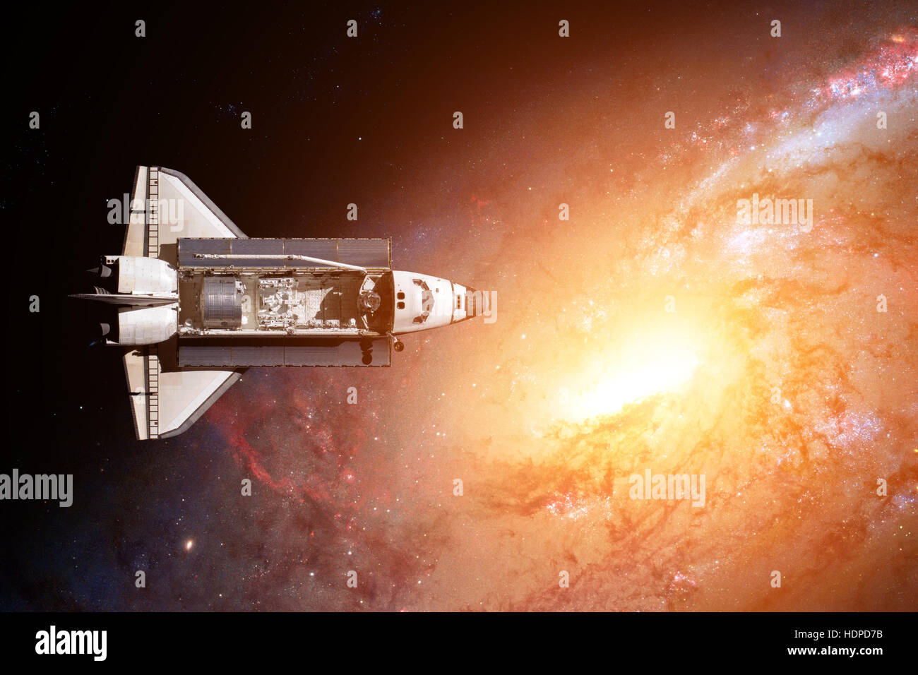 Space Shuttle and spiral galaxy Stock Photo - Alamy