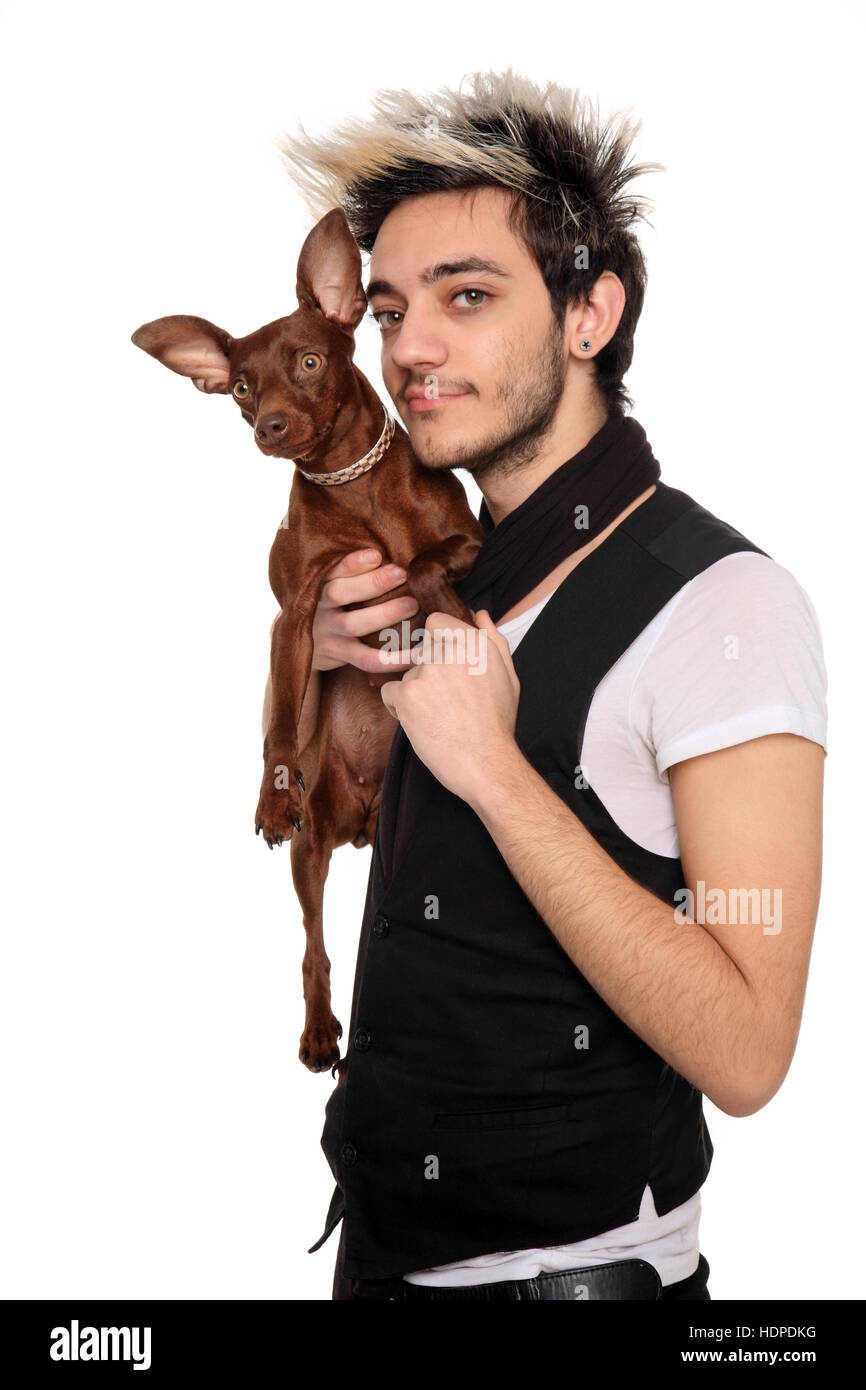 young man posing with pinscher isolated on a white background Stock ...