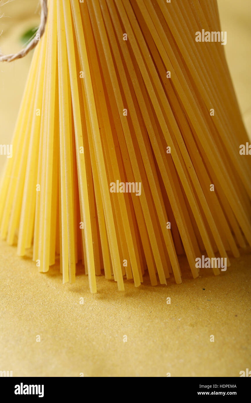 Bunch of raw italian spaghetti, cooking food Stock Photo - Alamy