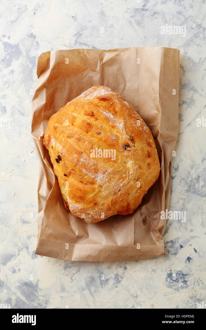 Fresh baked bread on paper, artisan food Stock Photo - Alamy