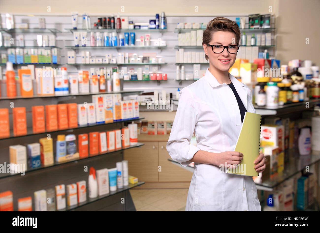 portrait of beautiful young pharmacist Stock Photo - Alamy