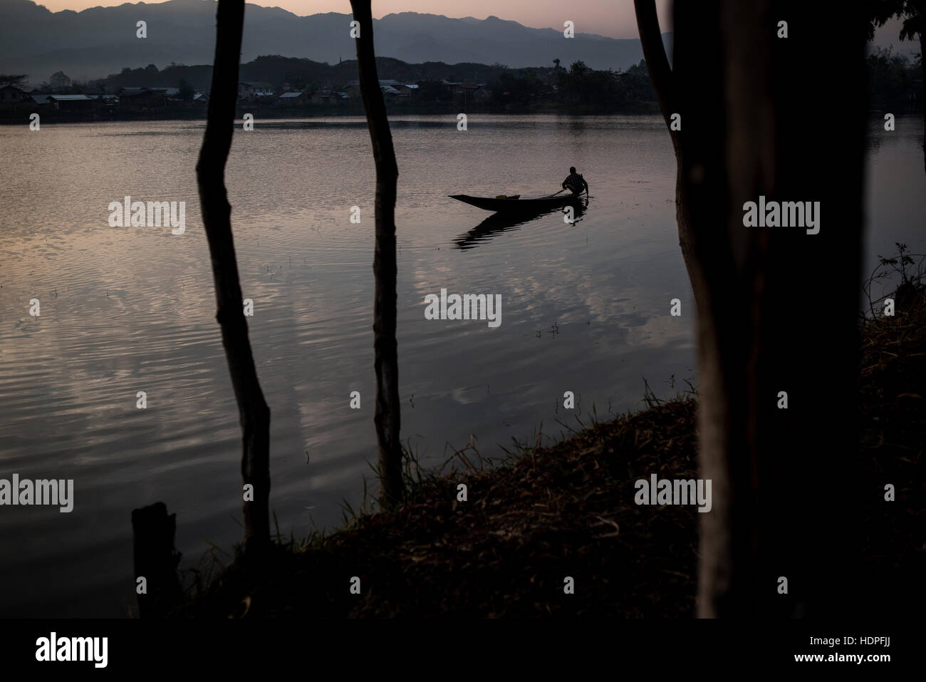 Fisherman working at the Tharzi Pond at sunset time, Nyaungshwe ...