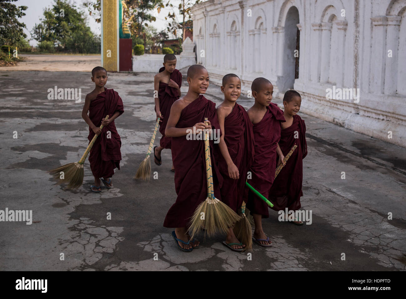 Buddhist monk sweeping hi-res stock photography and images - Alamy