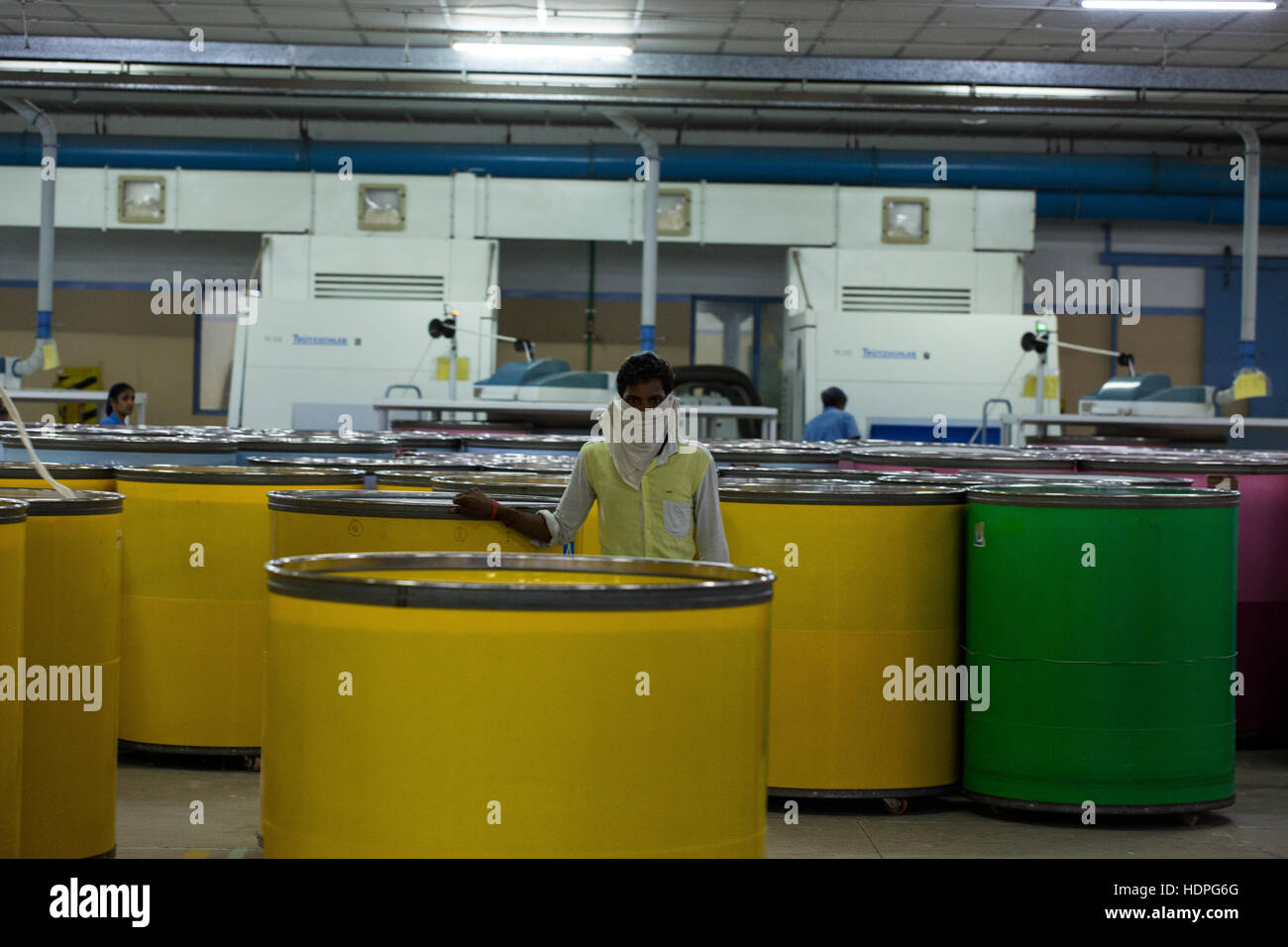 Cotton being dyed and woven at a factory in Tamil Nadu, southern India ...
