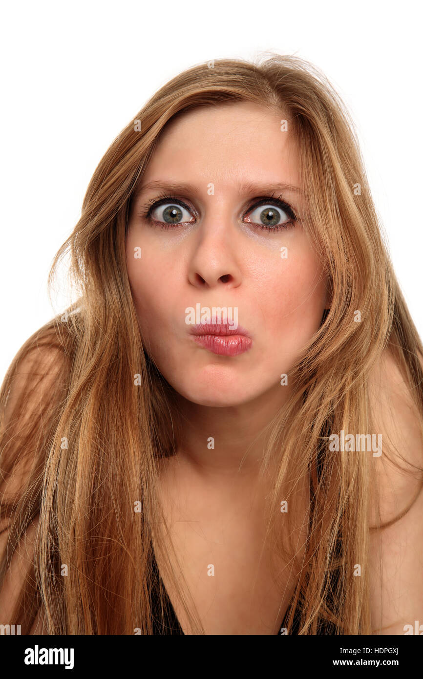 portrait of a beautiful young girl doing expressions isolated on a ...