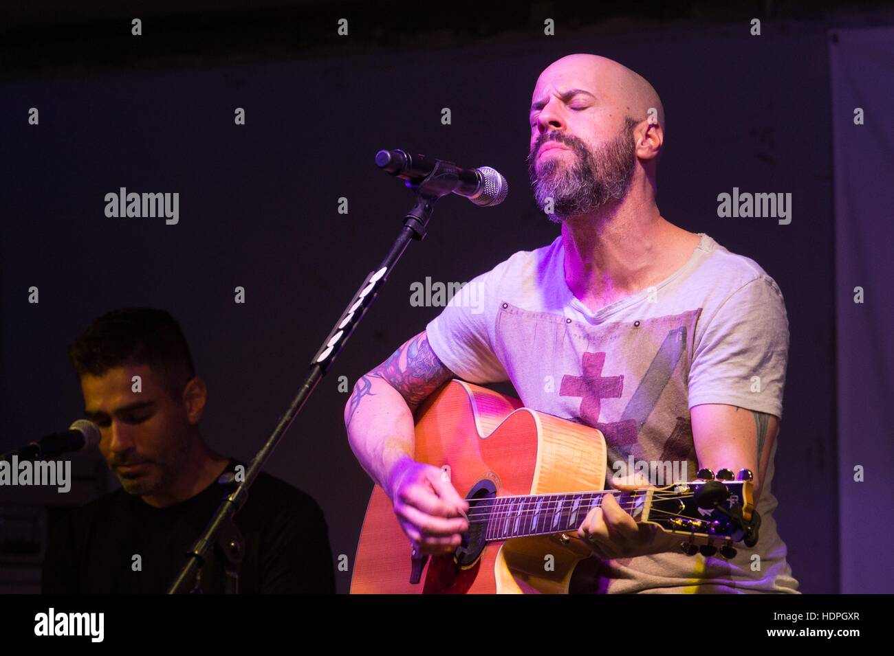 Singer Chris Daughtry performs for U.S. soldiers during a USO show at ...