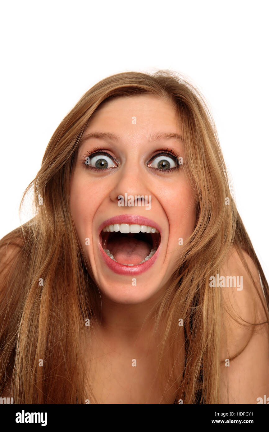 portrait of a beautiful young girl doing expressions isolated on a ...