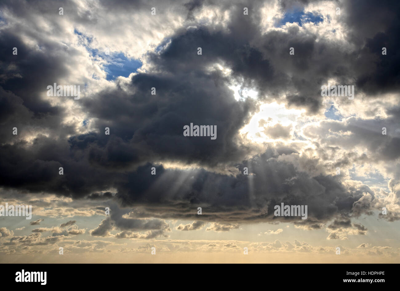 clouds with god rays on a beautiful cloudscape Stock Photo - Alamy