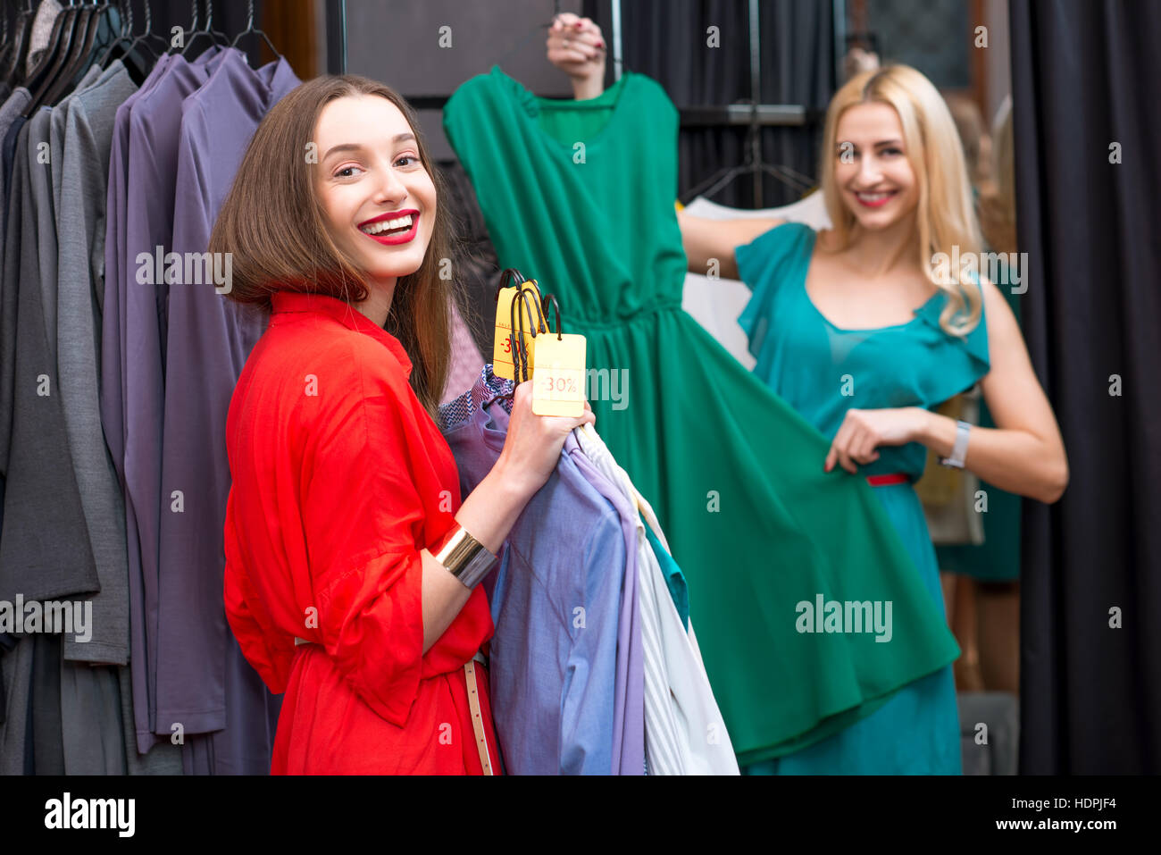 Women shopping clothes Stock Photo - Alamy