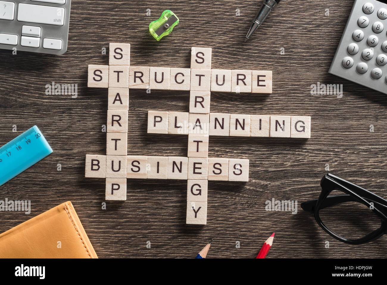 Conceptual business keywords on table with elements of game making ...