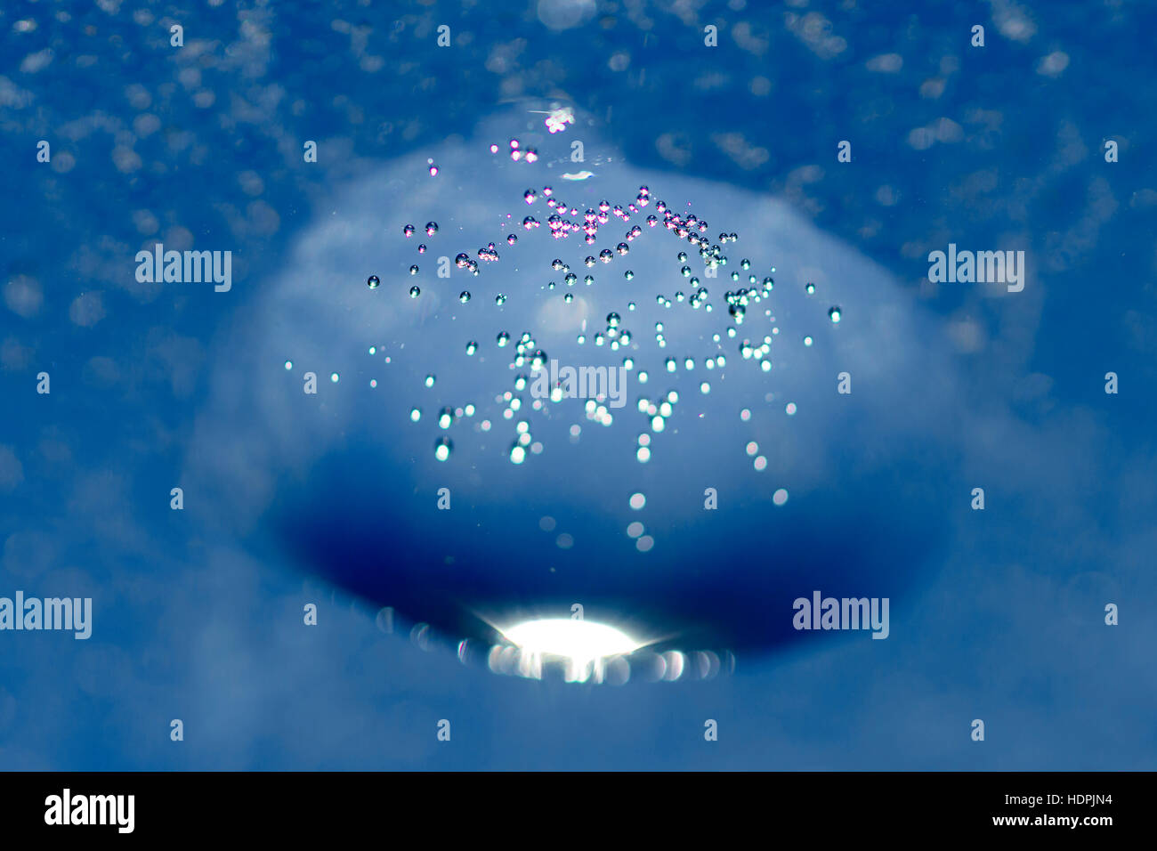 Beautiful micro air bubbles captured in water drops and frozen in ice ...