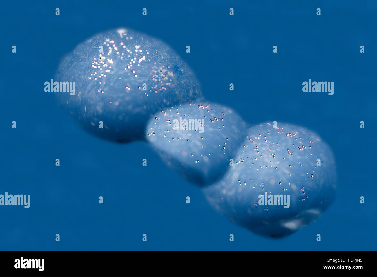 Beautiful micro air bubbles captured in water drops and frozen in ice ...