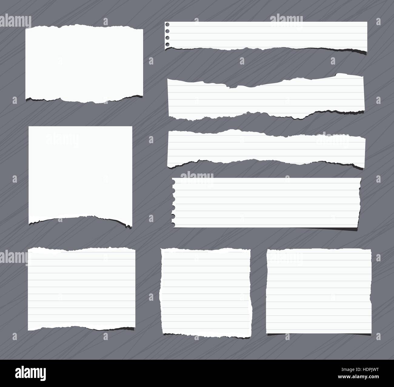 Pieces of white torn note, notebook, copy book paper sheets stuck on ...