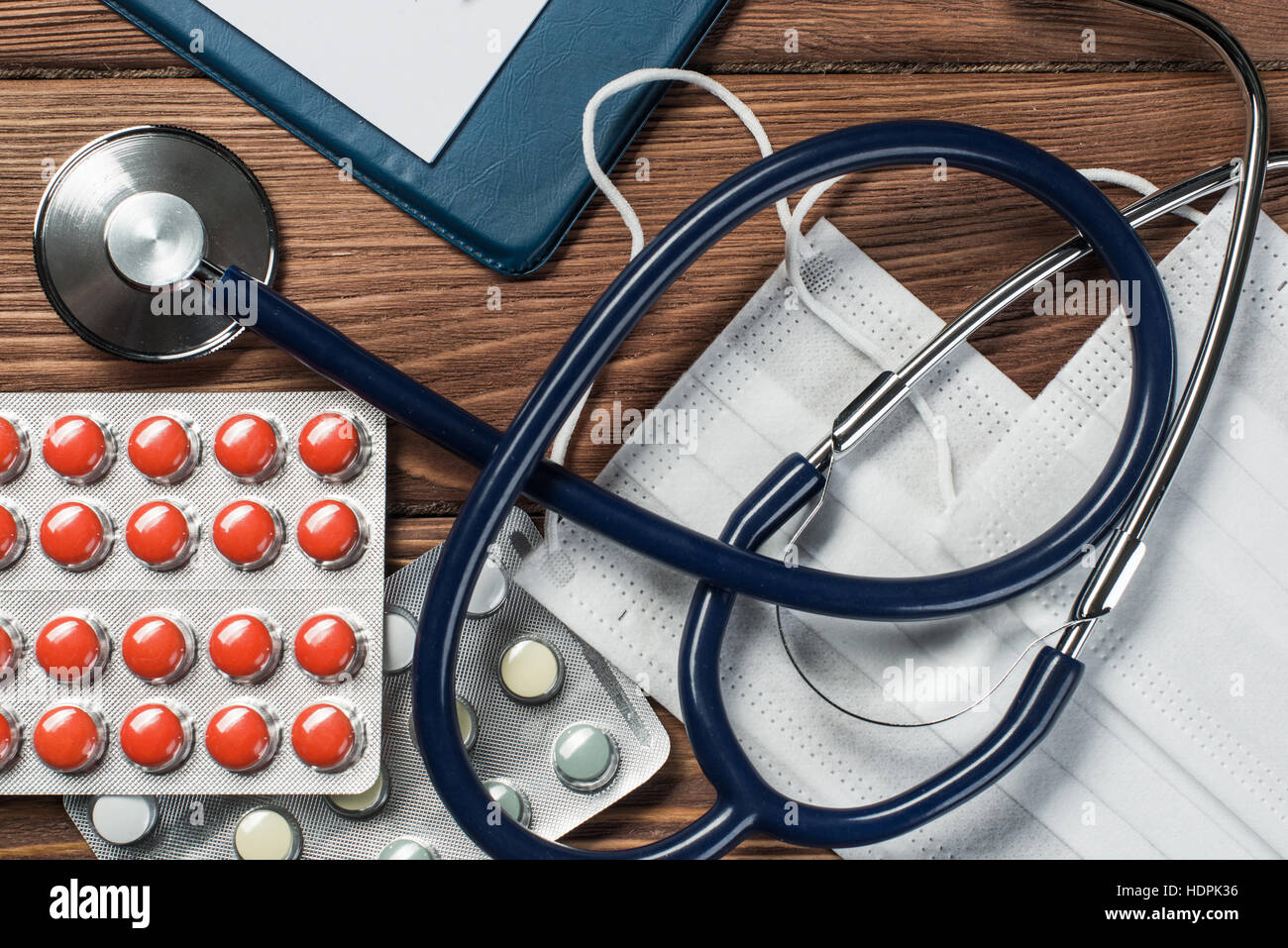 Desk of doctor with medicine things Stock Photo - Alamy
