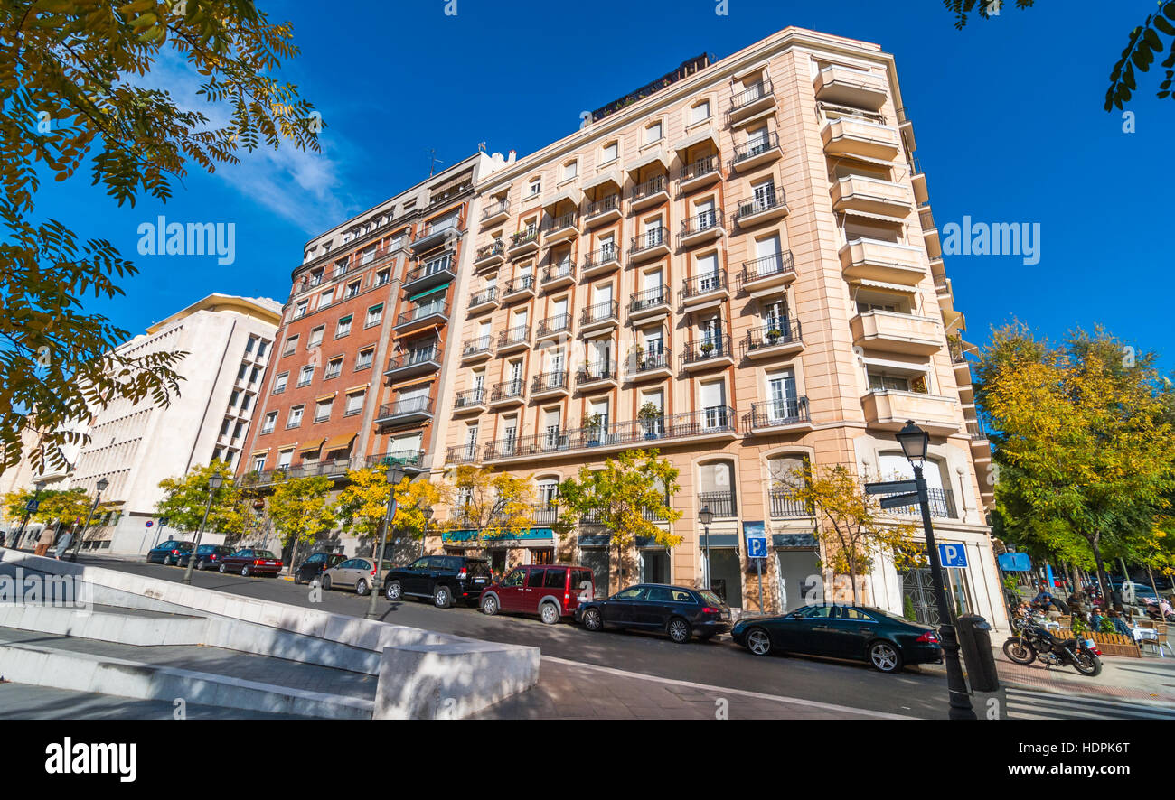 Post cards from Madrid. Cars parked in sloped Street in front of ...
