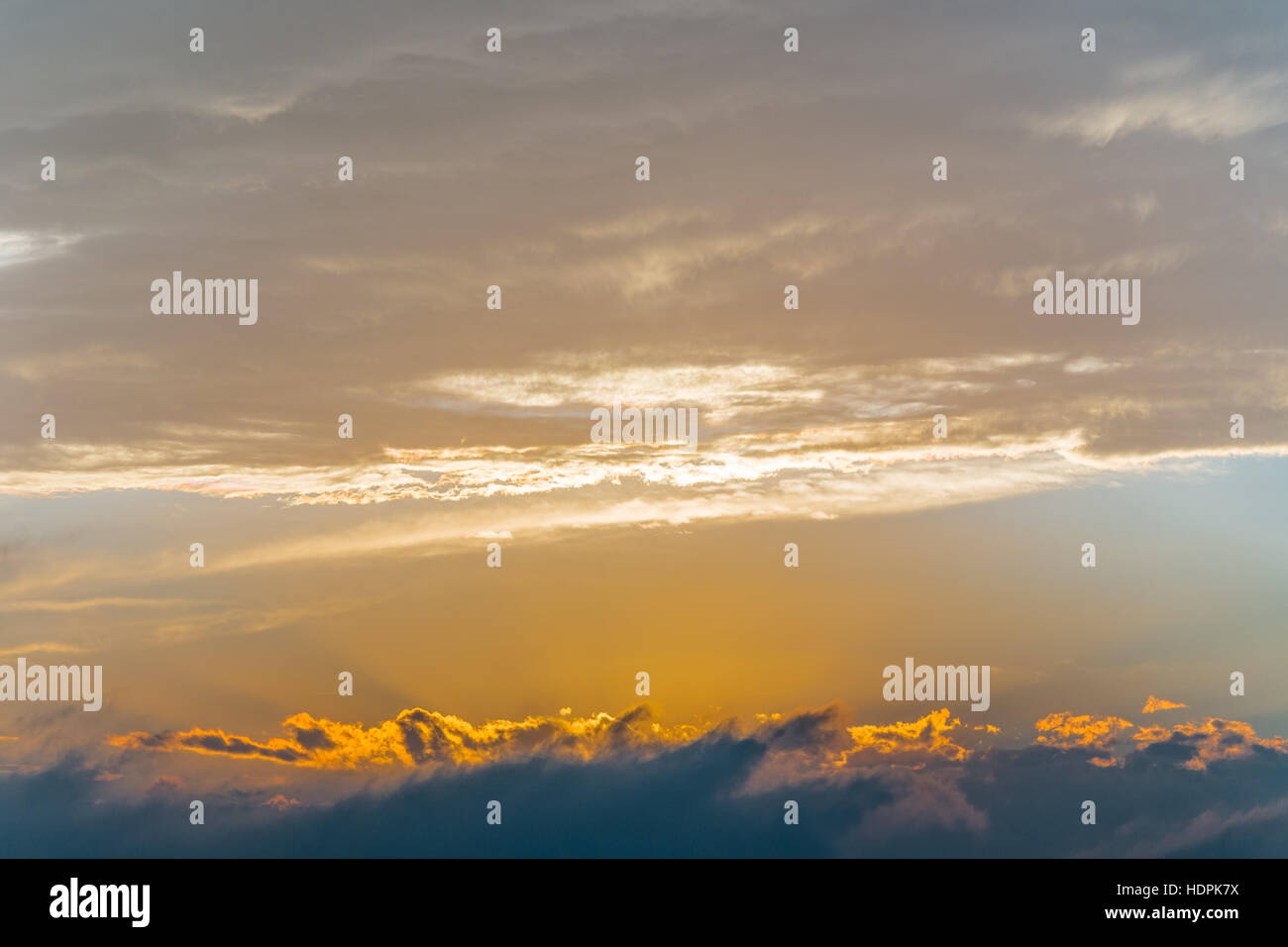 yellow sunset sky with clouds Stock Photo - Alamy