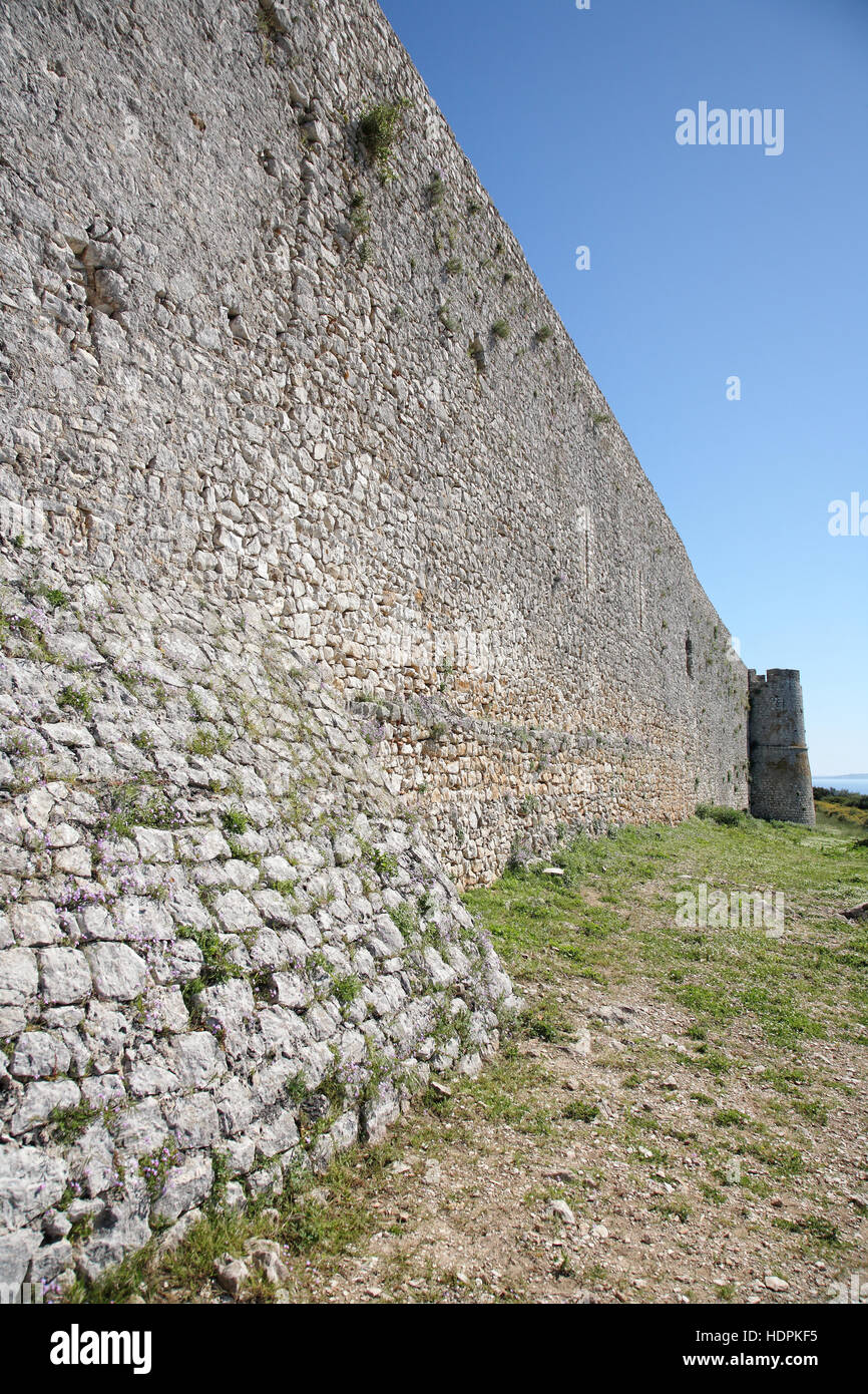 fort with very high walls in greece Stock Photo - Alamy