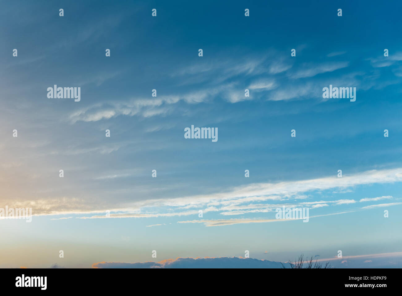 yellow sunset sky with clouds Stock Photo - Alamy