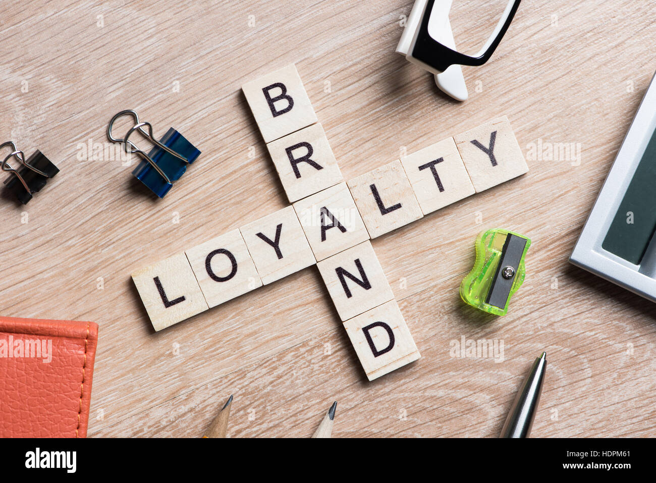 Conceptual business keywords on table with elements of game making ...