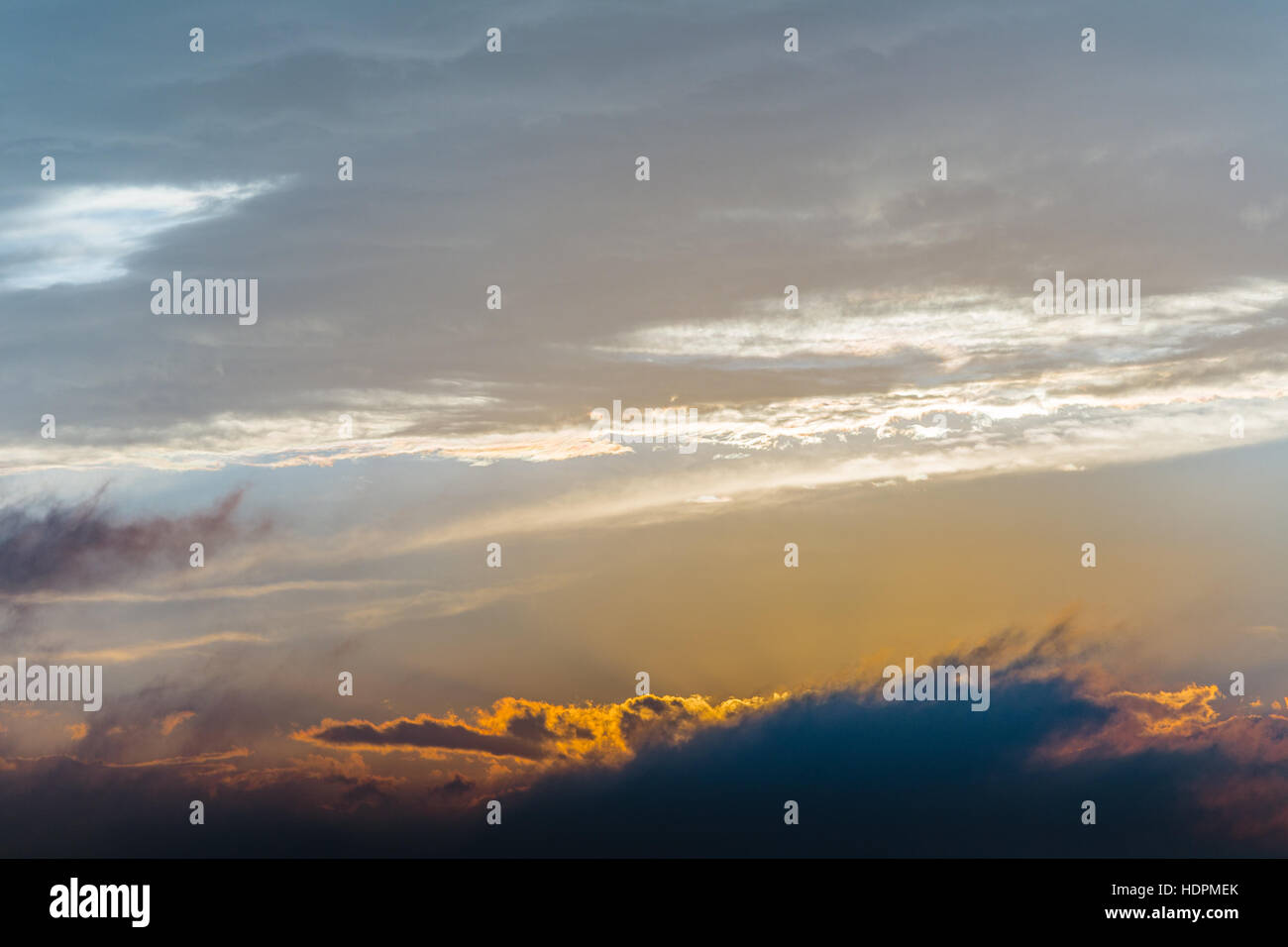 yellow sunset sky with clouds Stock Photo - Alamy