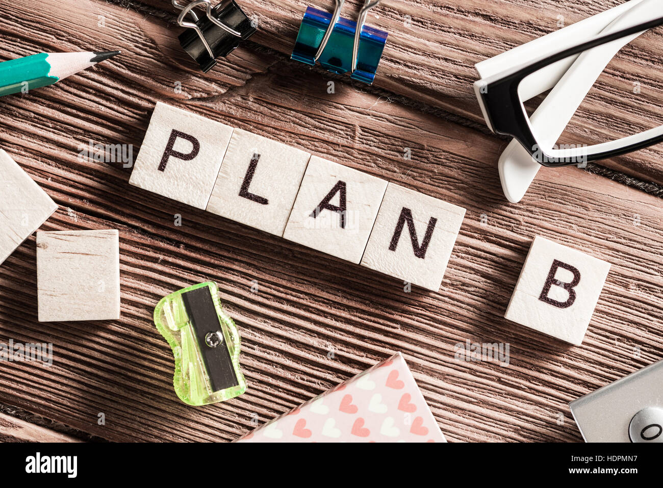 Conceptual business keywords on table with elements of game making ...