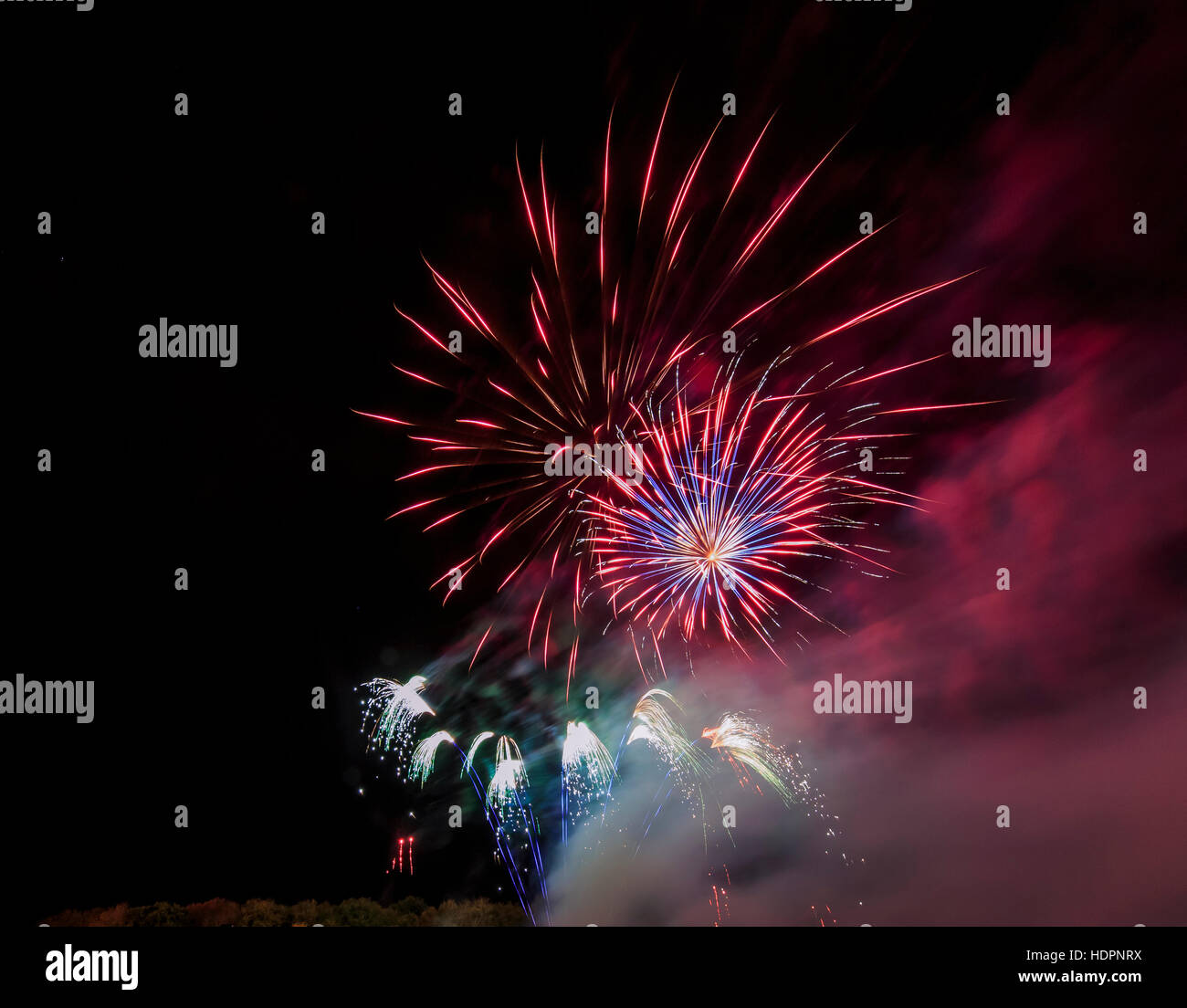 Colorful fireworks isolated with simple background Stock Photo - Alamy