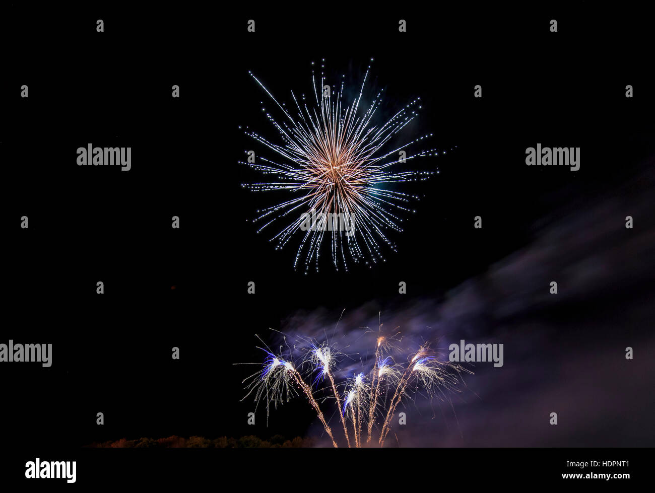 Colorful fireworks isolated with simple background Stock Photo - Alamy