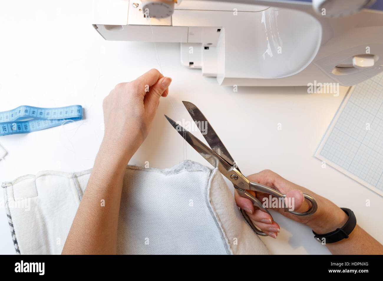 Woman background of sewing machine Stock Photo - Alamy