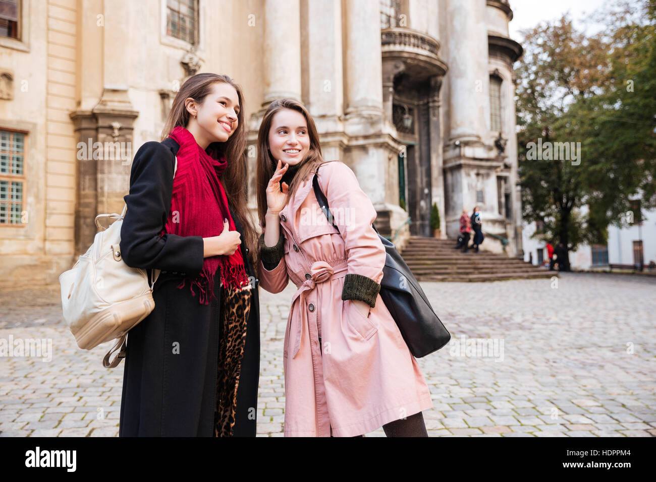 Portraif of two friends. on the street Stock Photo - Alamy