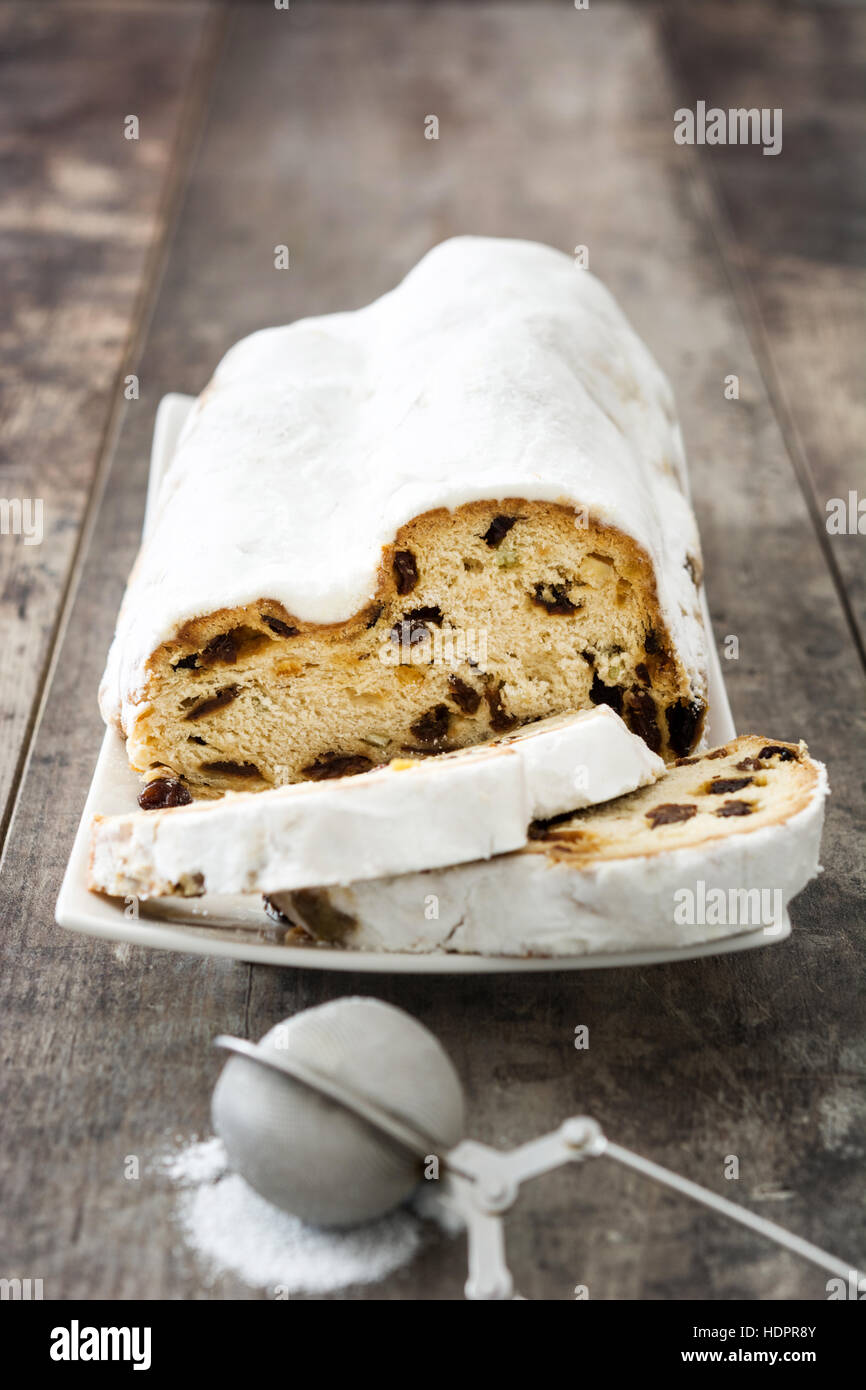 Christmas stollen. Traditional German Christmas dessert on wooden ...