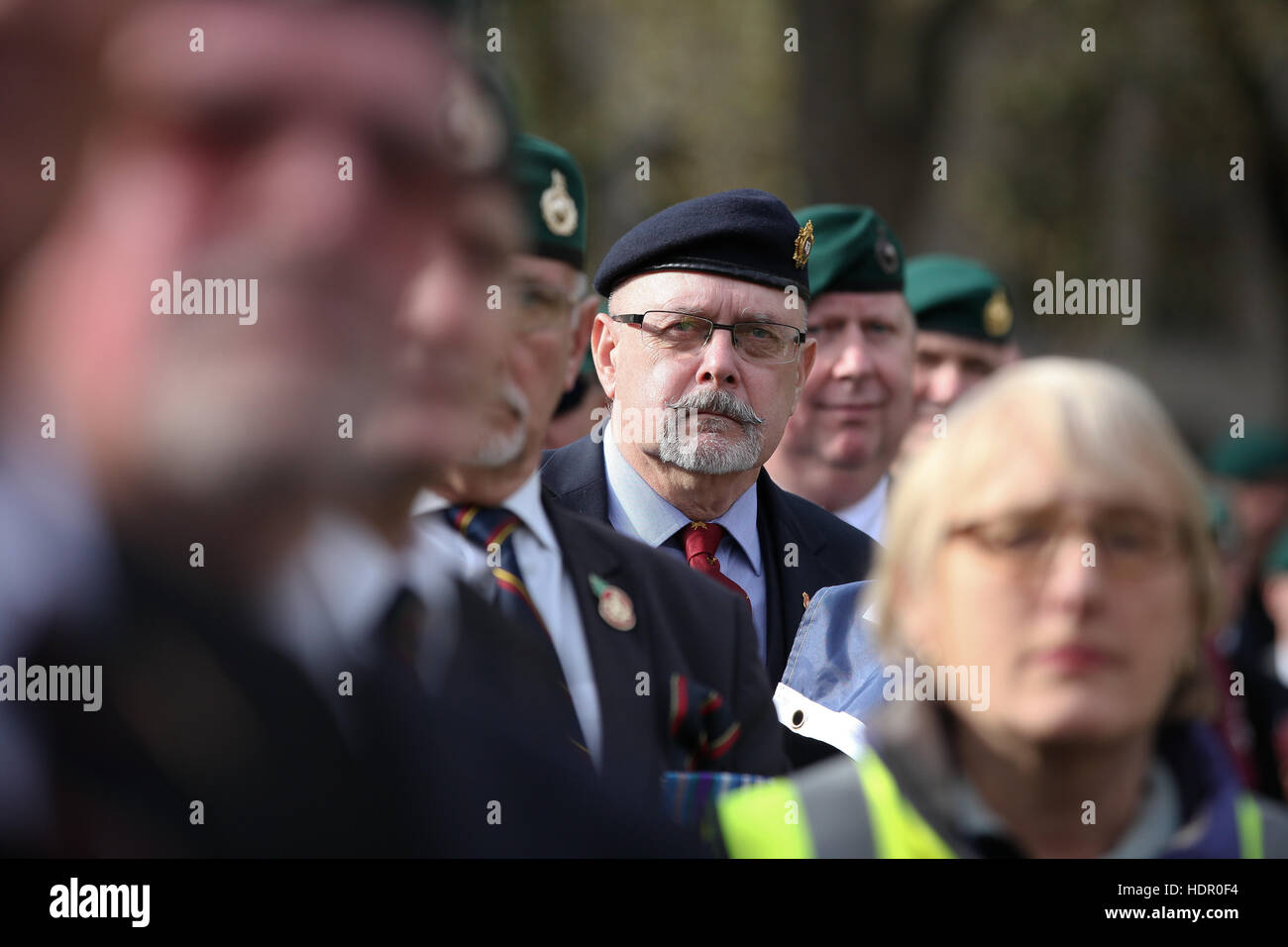 Former and serving members of the armed forces take part in a rally in ...