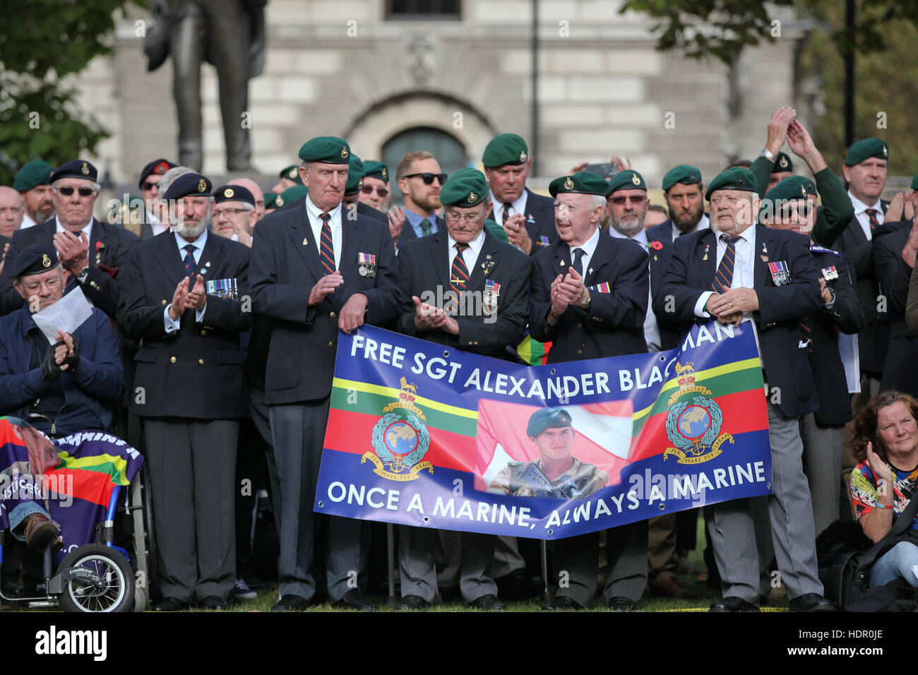 Former and serving members of the armed forces take part in a rally in ...