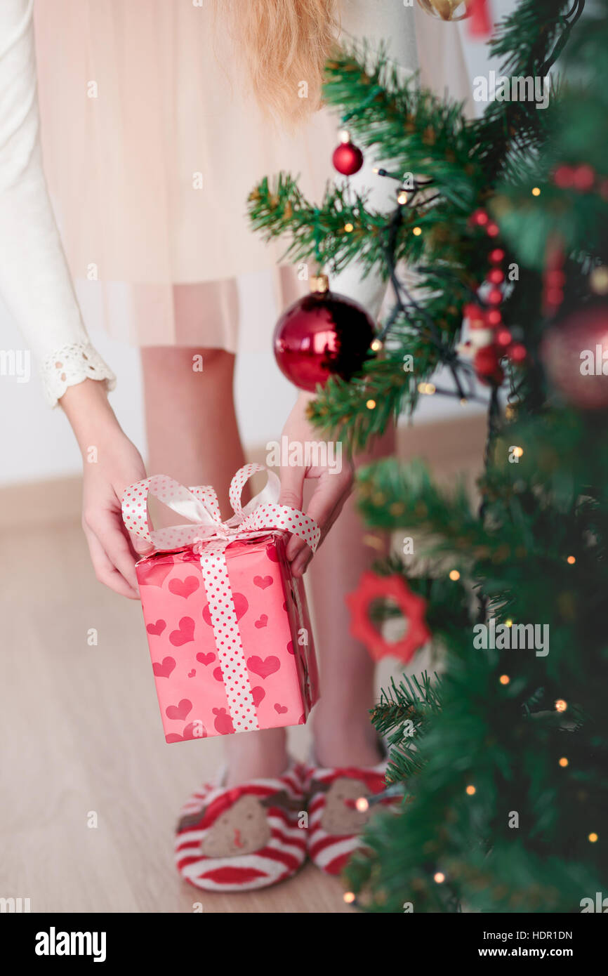 Child getting present christmas hi-res stock photography and images - Alamy