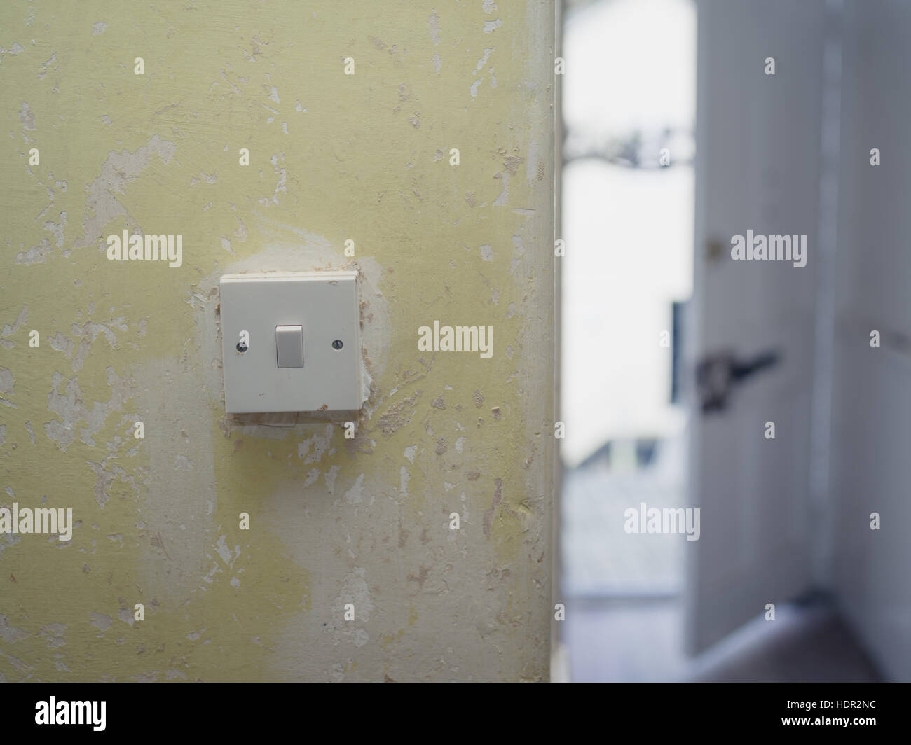 An electrical switch in a domestic hallway Stock Photo - Alamy