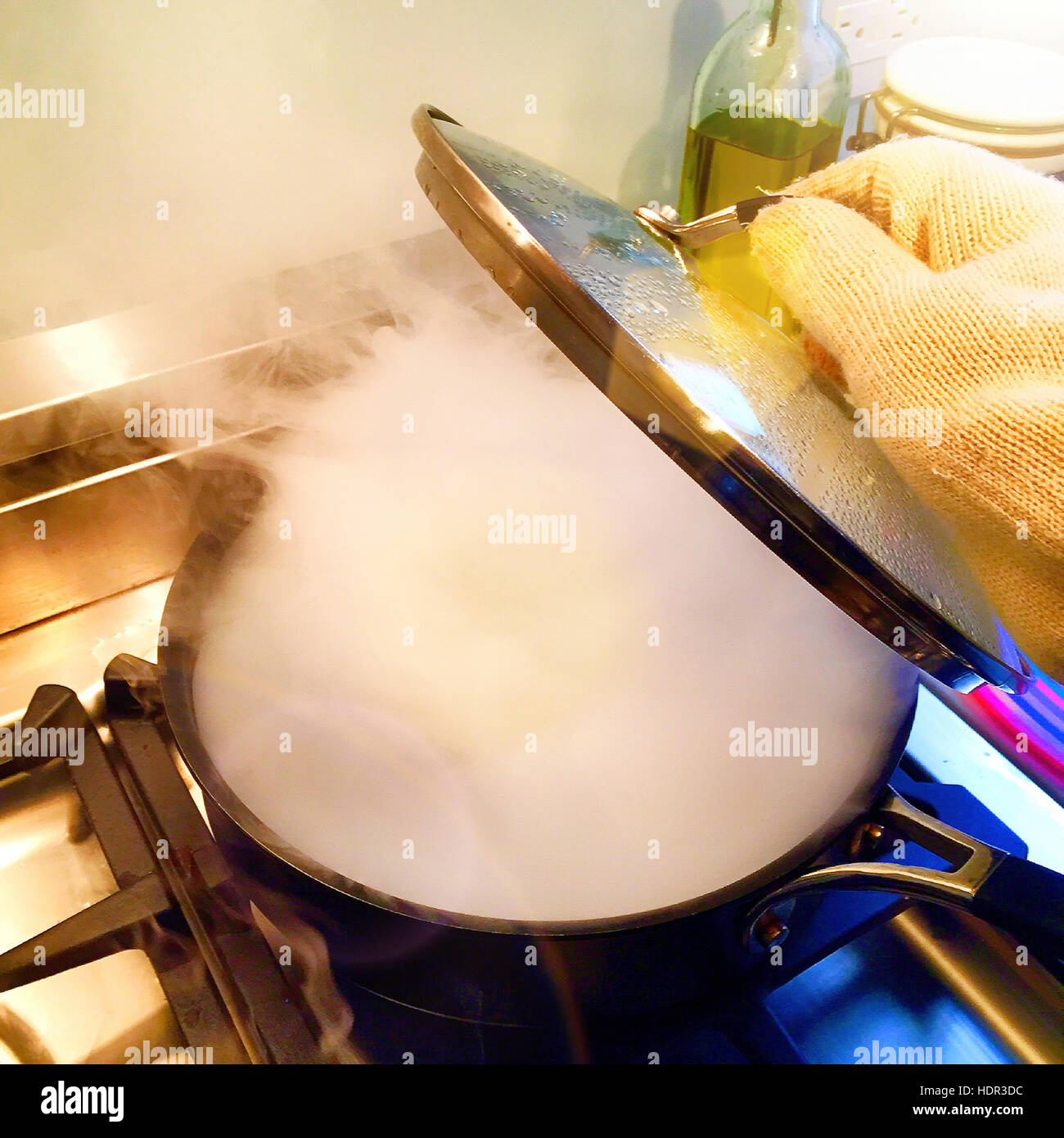 Steaming Pot on Residential Stovetop Stock Photo - Alamy