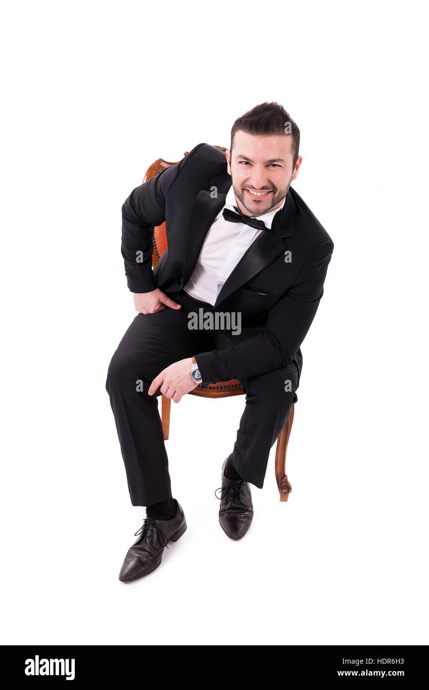 Confident Successful Smart Looking Man Smiling, sitting on chair and ...
