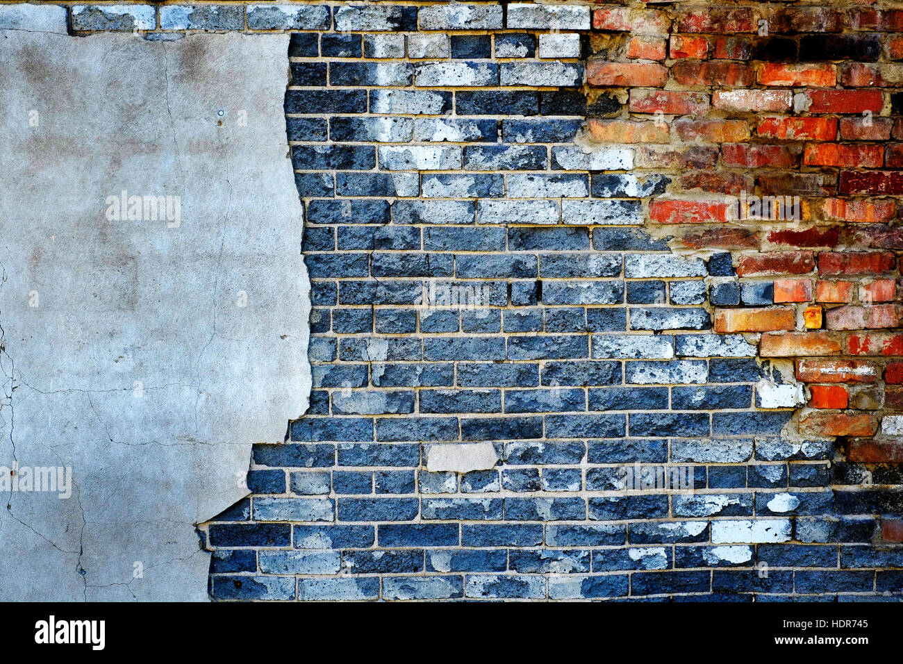 Gray and red bricks on plastered wall that is falling apart Stock Photo ...