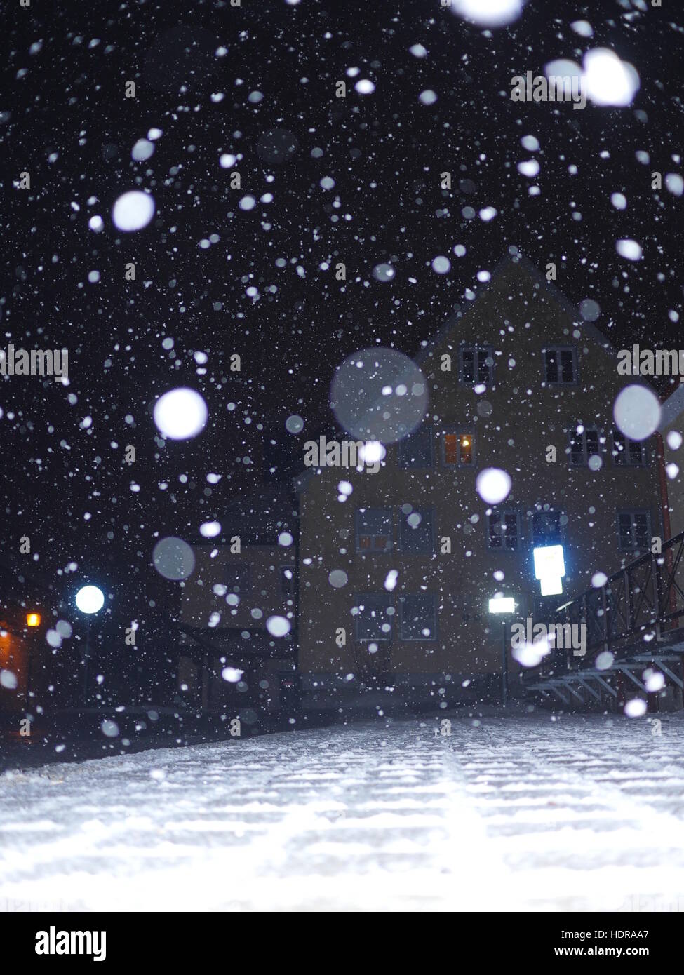 snowfall in the city at night Stock Photo - Alamy