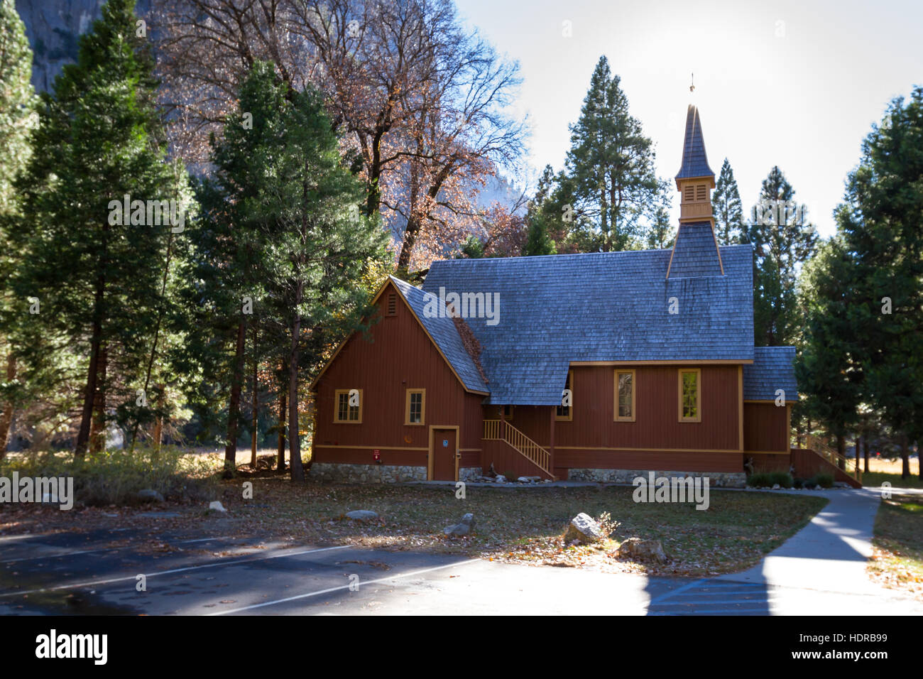 Small red chapel in the Yosemite Valley viewed in the afternoon with ...