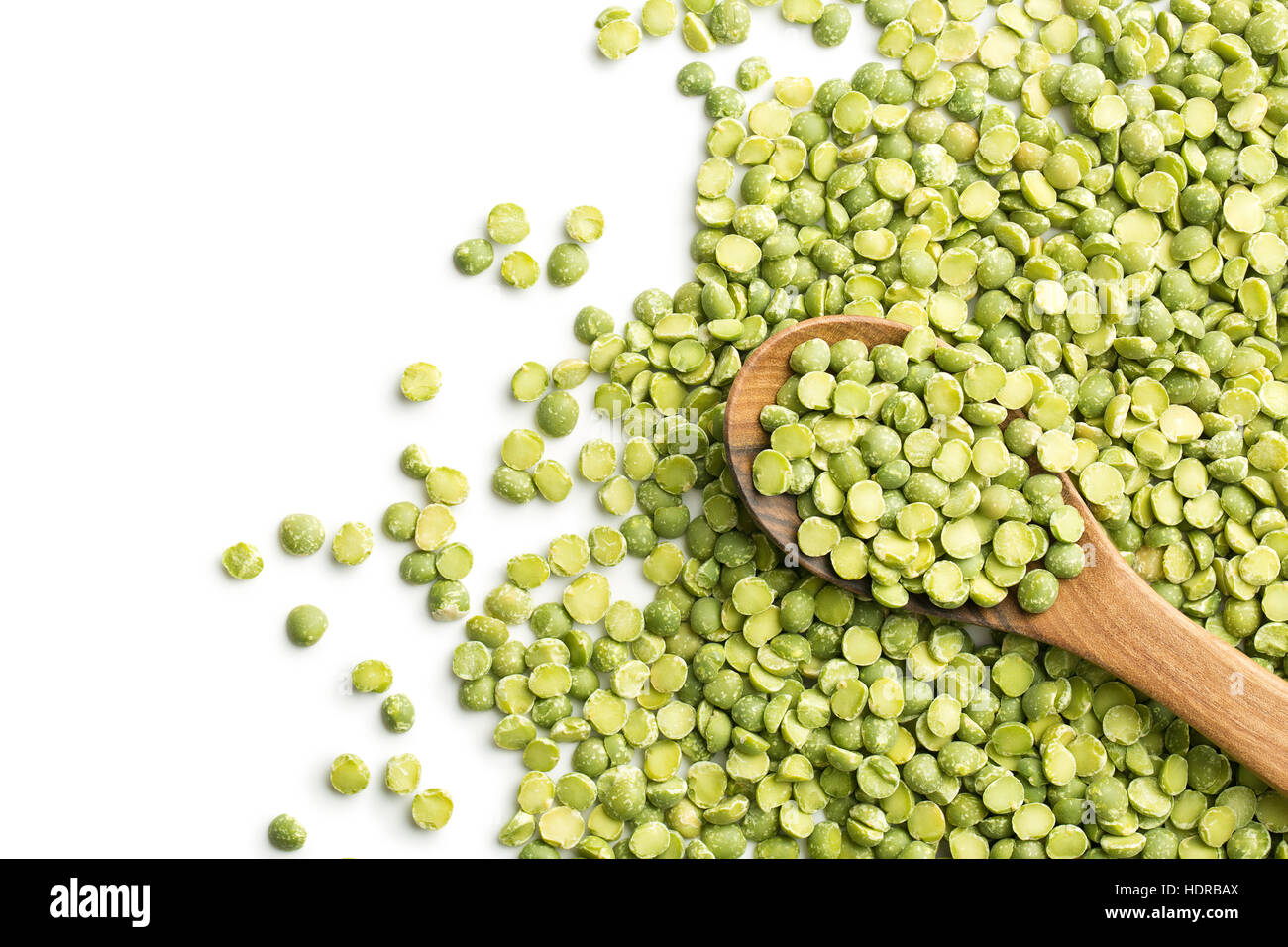Green split peas in wooden spoon isolated on white background Stock ...